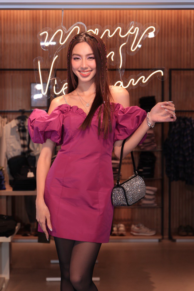 Miss Grand Thùy Tiên dịu dàng với váy hồng, tóc tết, khác hẳn phong ...
